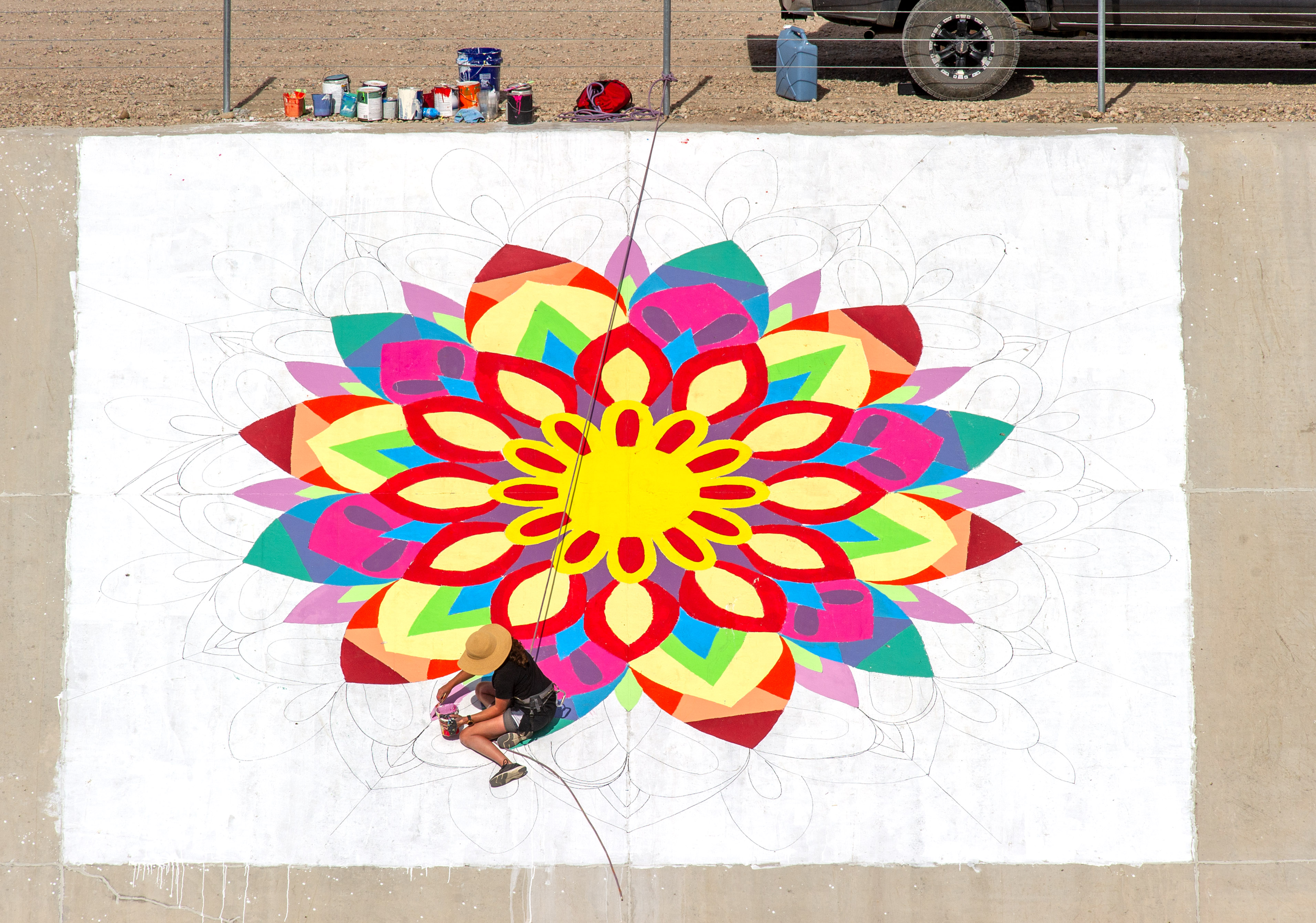 Murals return to Pueblo’s levee as artists make concrete above the ...