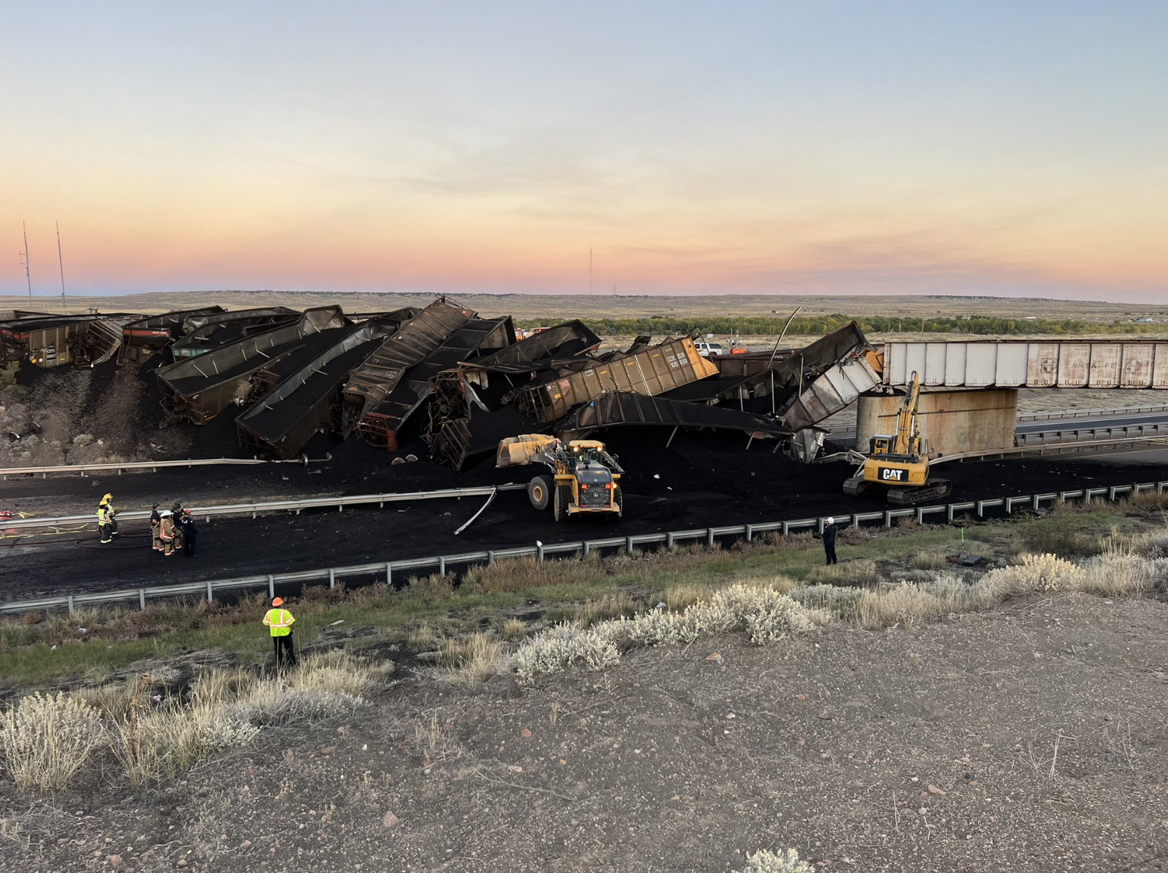 Train hauling coal derails over Interstate 25 near Pueblo, killing ...