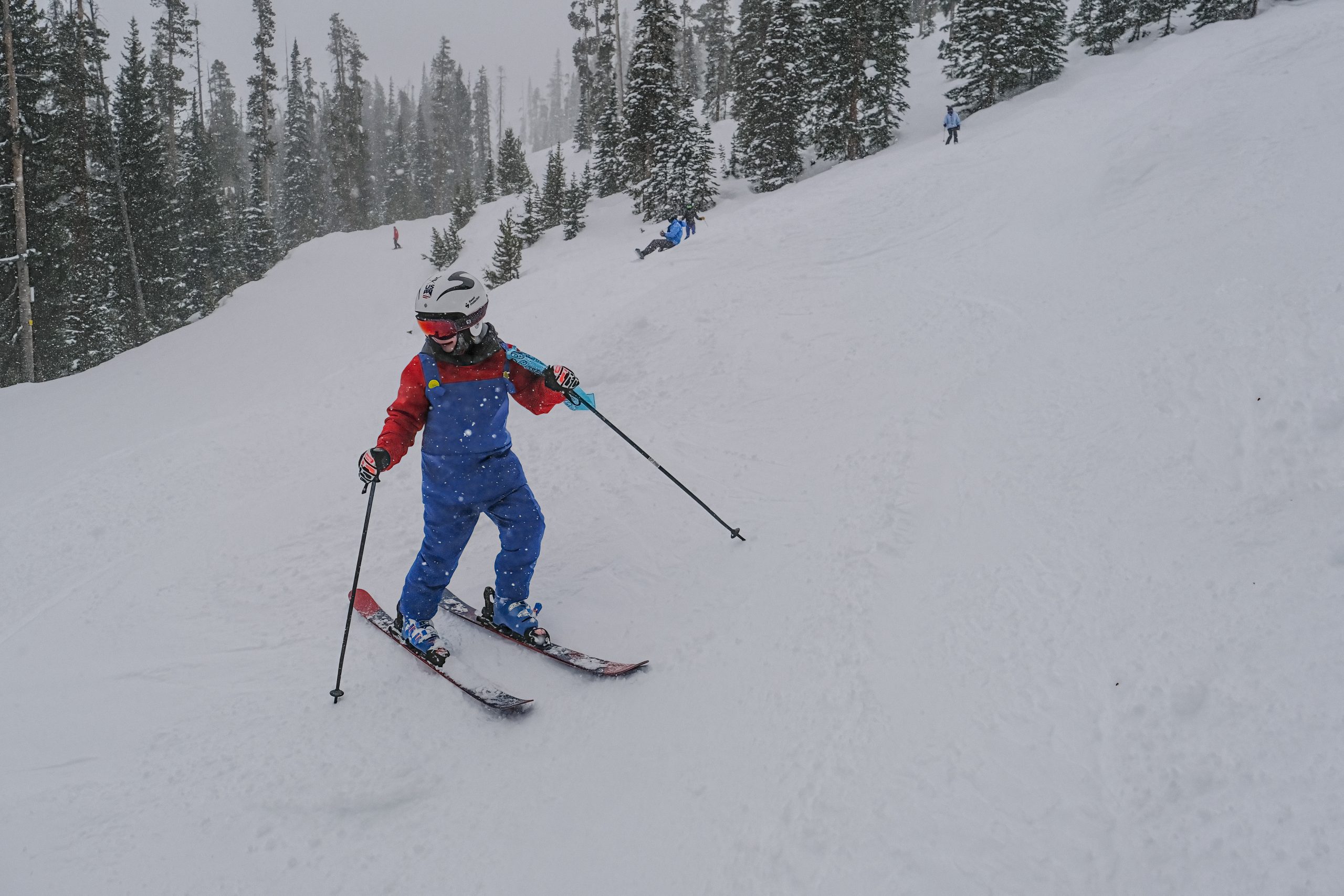 450 skiers, boarders shred moguls to help families through bumpy spots